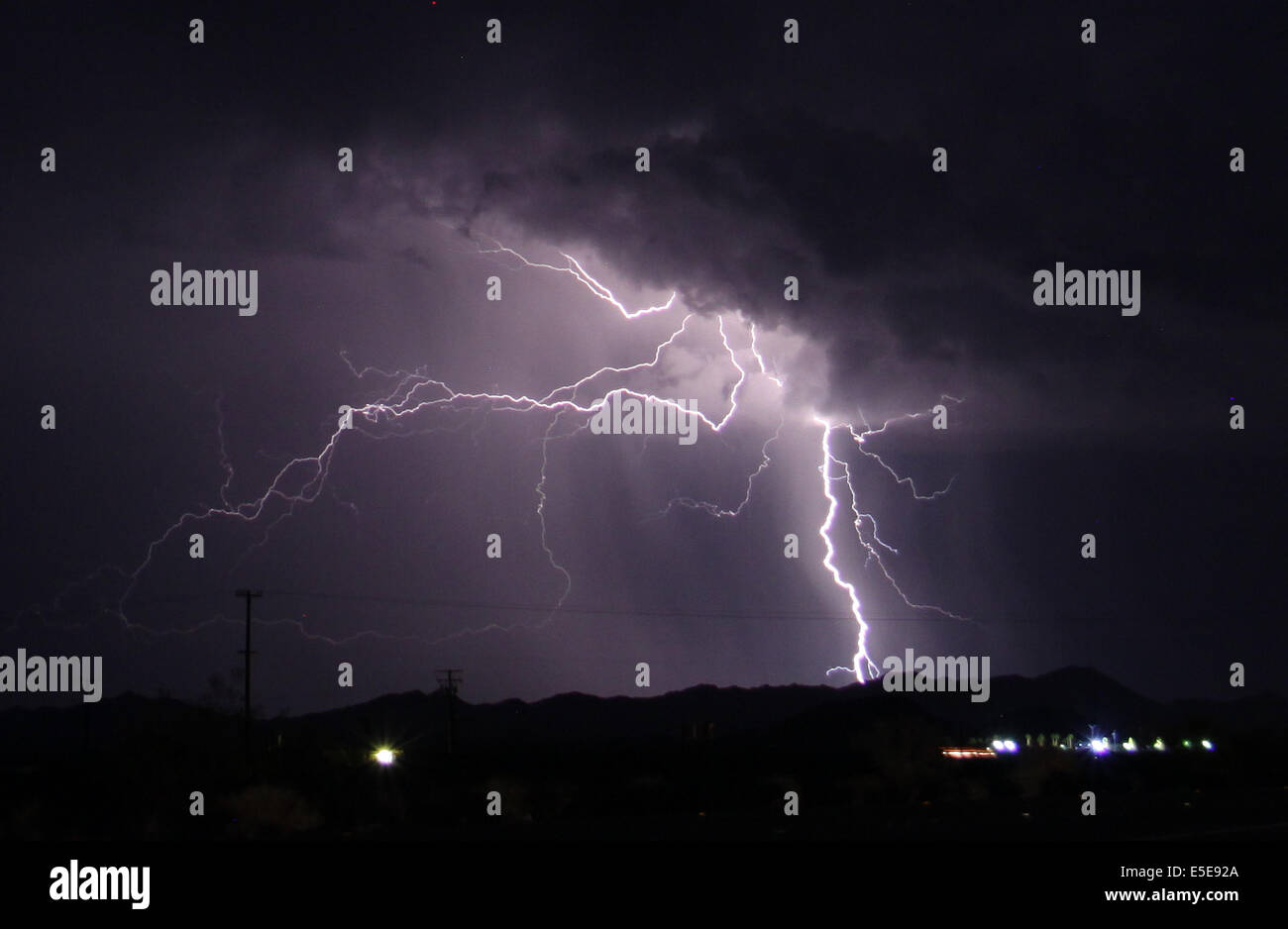 Lightning bolts light up the night from a series of monsoon storms ...