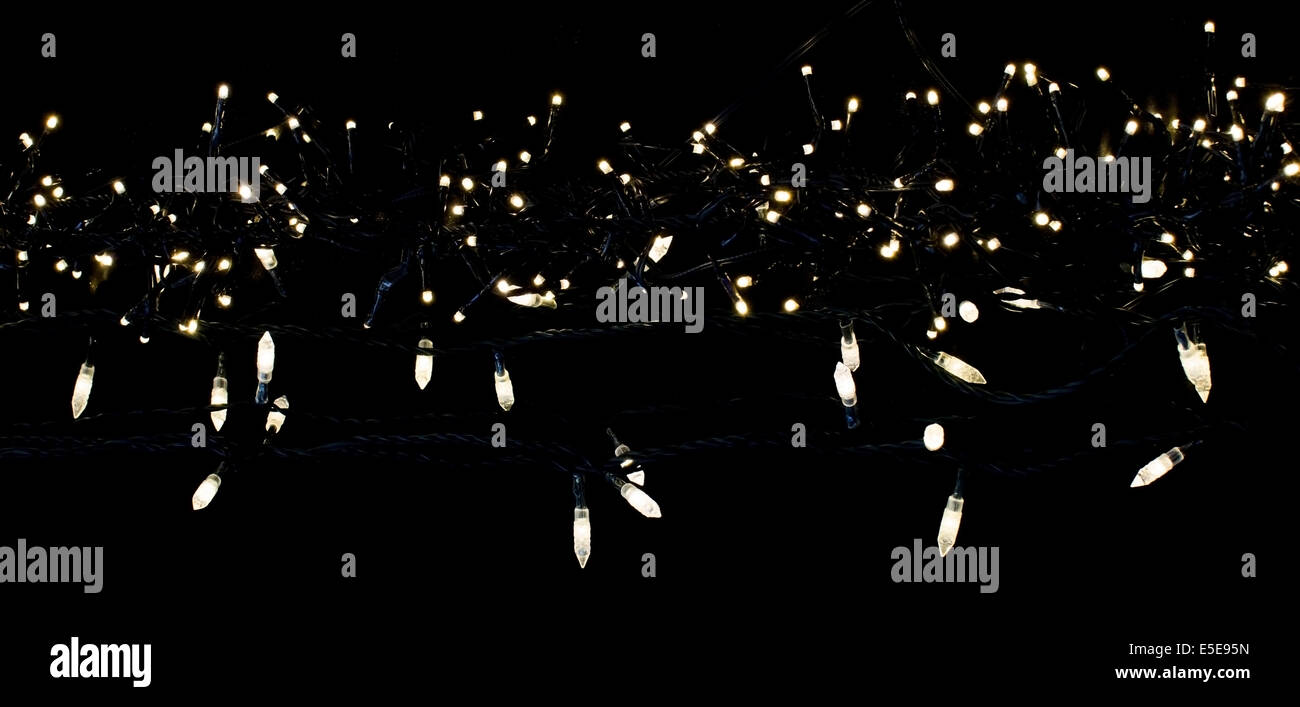 String of christmas lights on black Stock Photo - Alamy