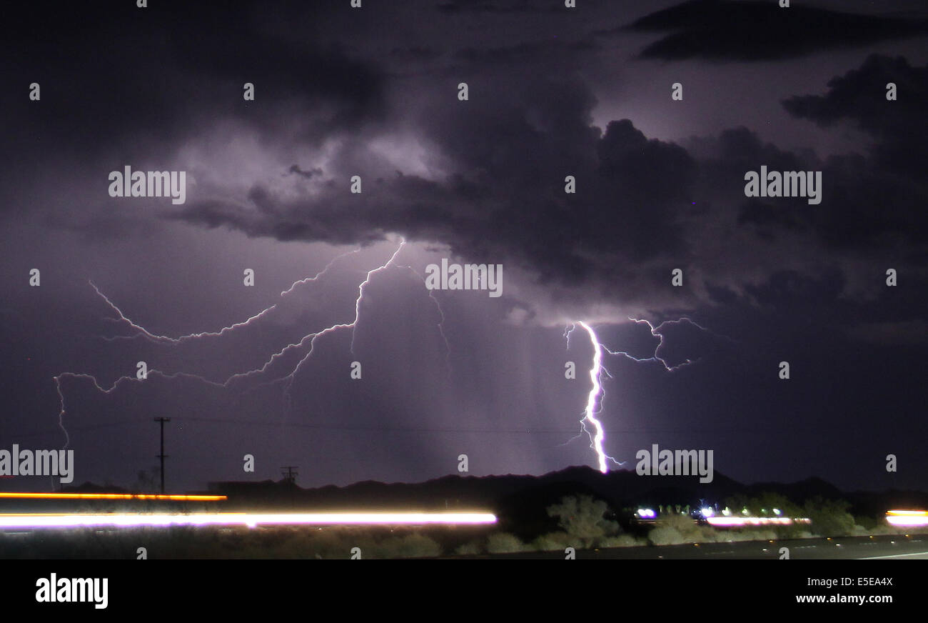 July 28,2014. Needles CA. Lightning bolts light up the night from a ...