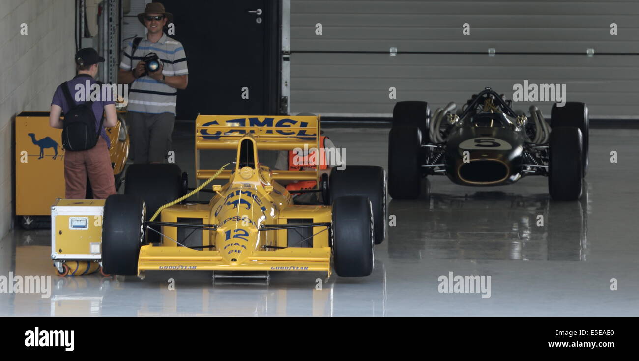 Two Formula One Grand Prix cars - one from the 1960s, one from the ...
