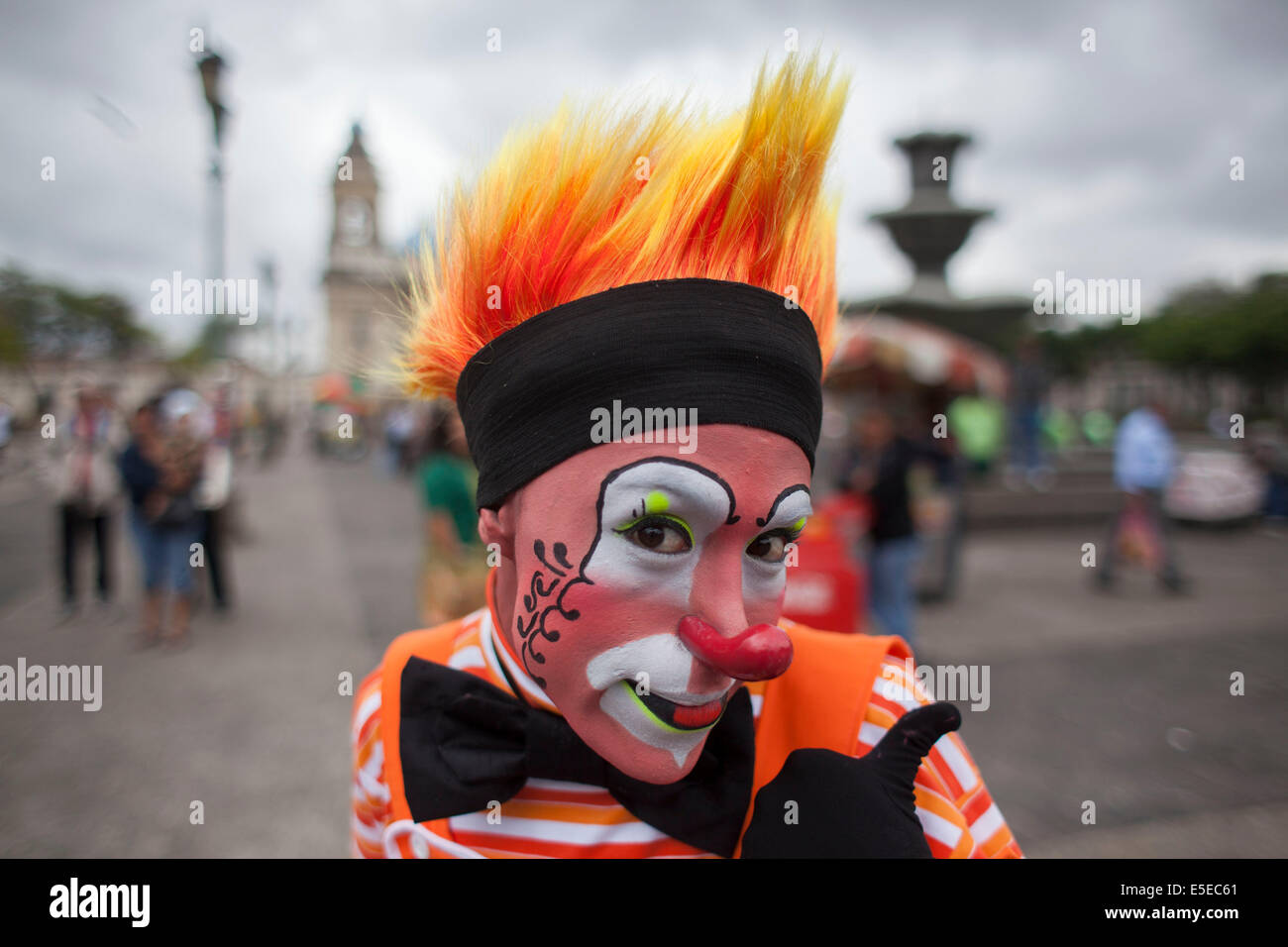 Guatemala City, Guatemala. 29th July, 2014. A clown poses for photos ...