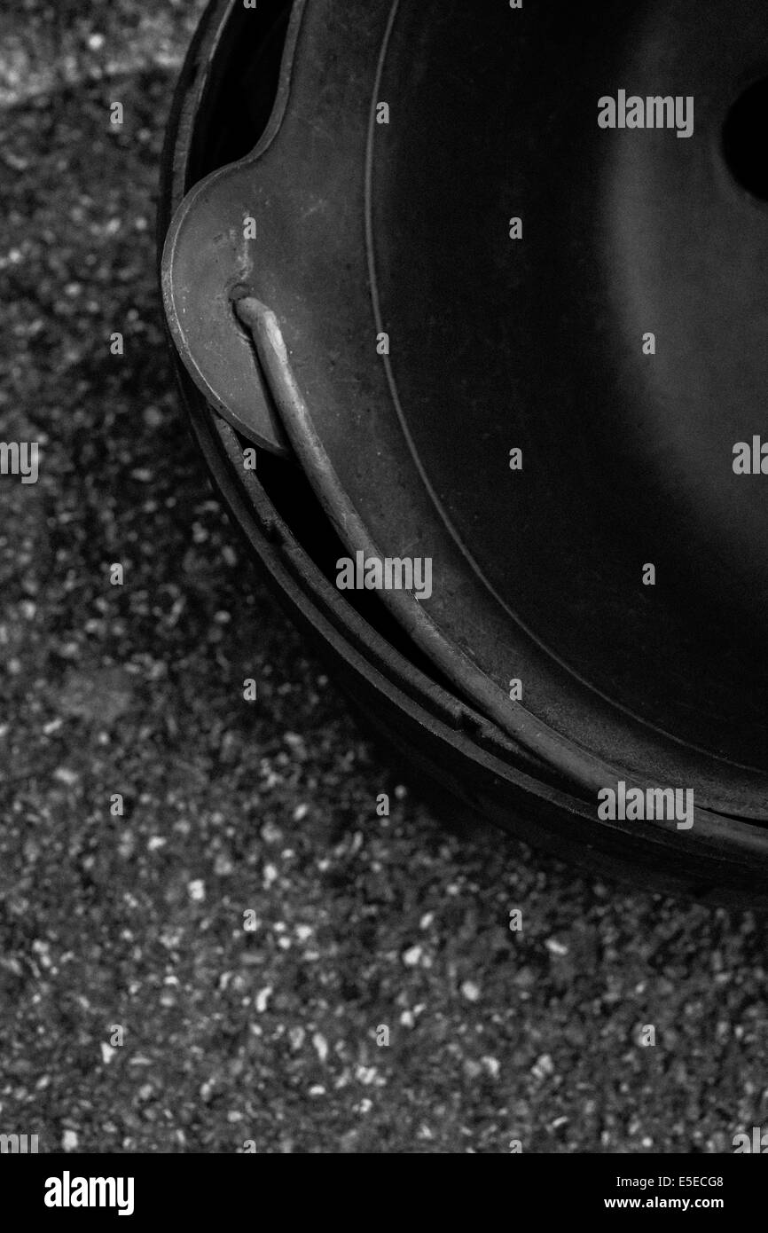Old tin metal vintage buckets on the street corner Stock Photo - Alamy