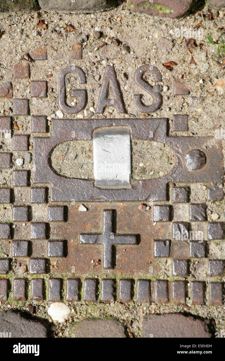 Gas plates on streets in Holland Stock Photo - Alamy