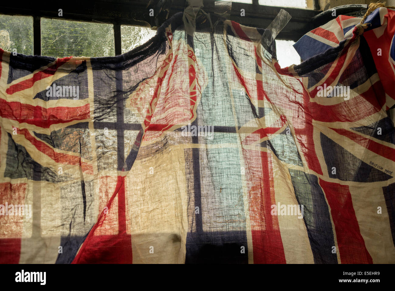 Union Jack Flags draped in a church window Stock Photo - Alamy
