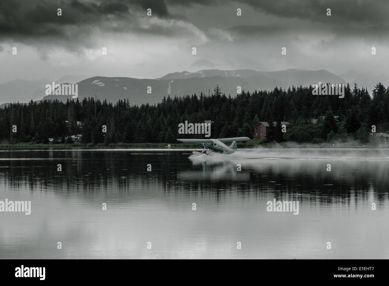 Hydroplane taking off in Homer split, Homer, Alaska Stock Photo - Alamy