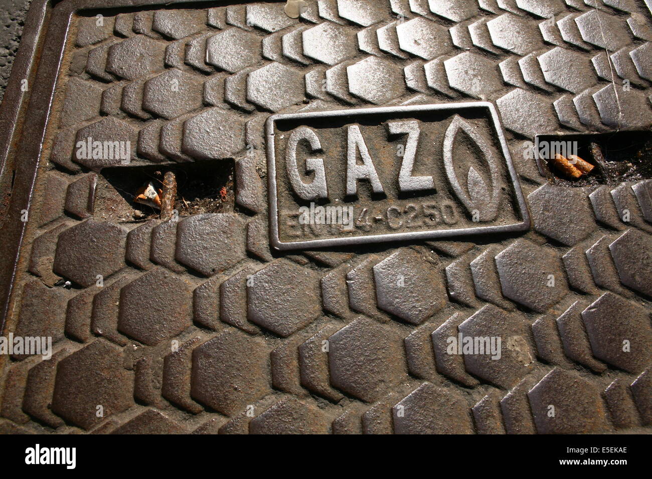 Gas plates on streets in France Stock Photo - Alamy