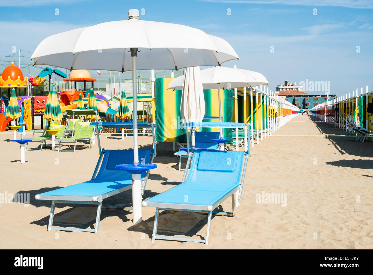 Blue sunbeds and umbrellas on the beach Stock Photo - Alamy