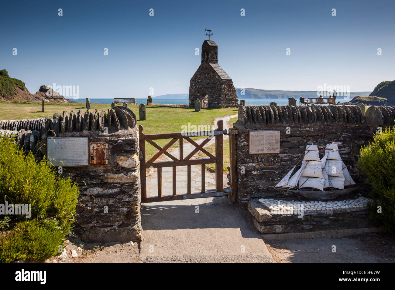 Ruins of the Church of St. Brynach the Abbot, with plaque and ship ...