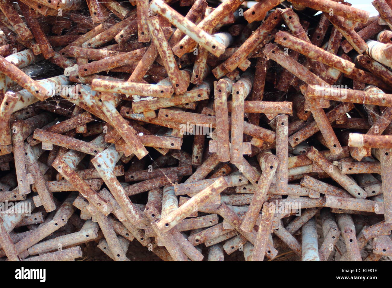 Rusty metal spikes for constrction moulding Stock Photo - Alamy