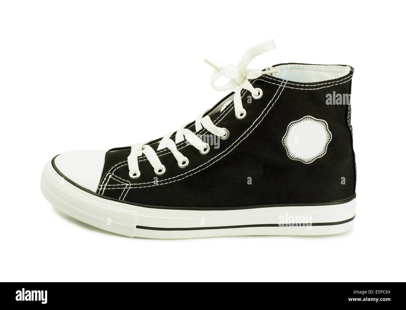 Canvas shoe profile on a white background Stock Photo - Alamy