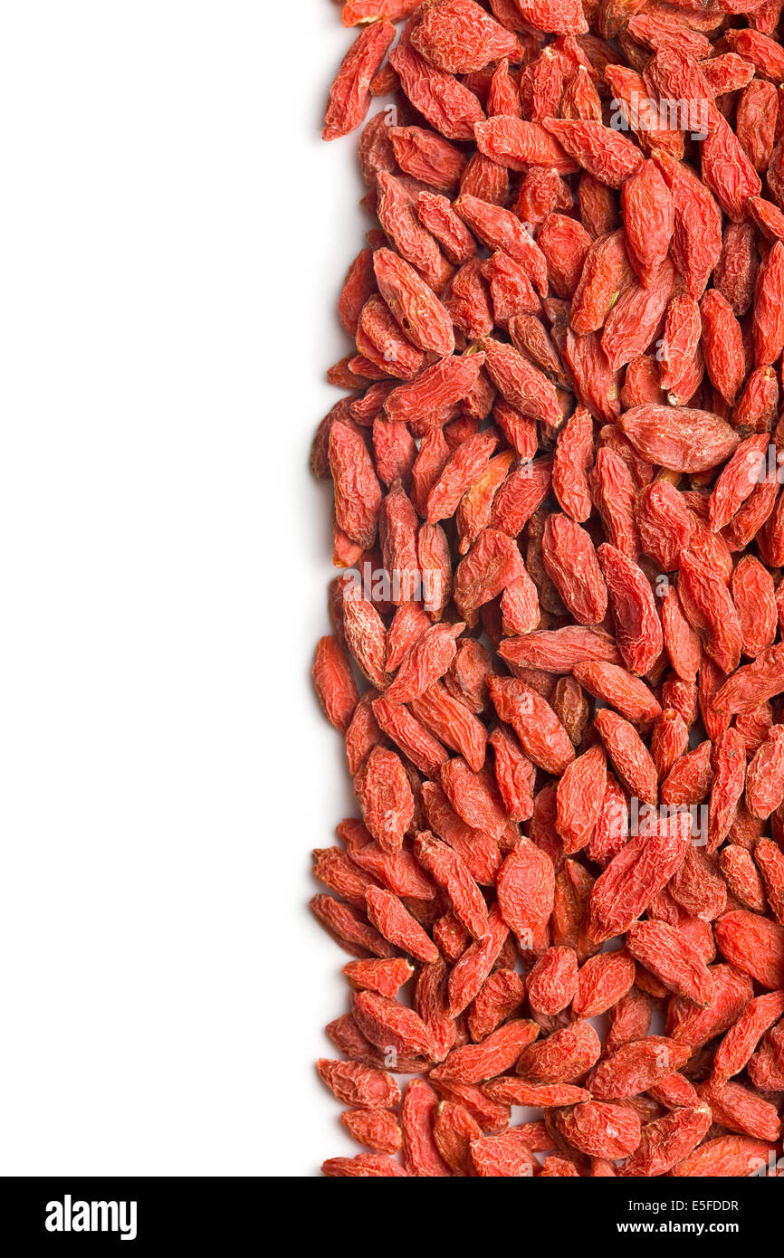 dried goji berries on white background Stock Photo - Alamy