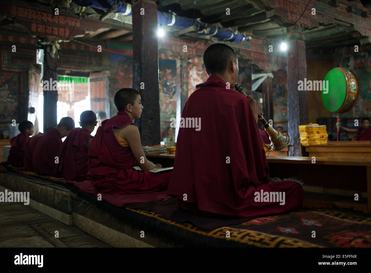 Monks during morning prayer in Thiksey Monastery Stock Photo - Alamy