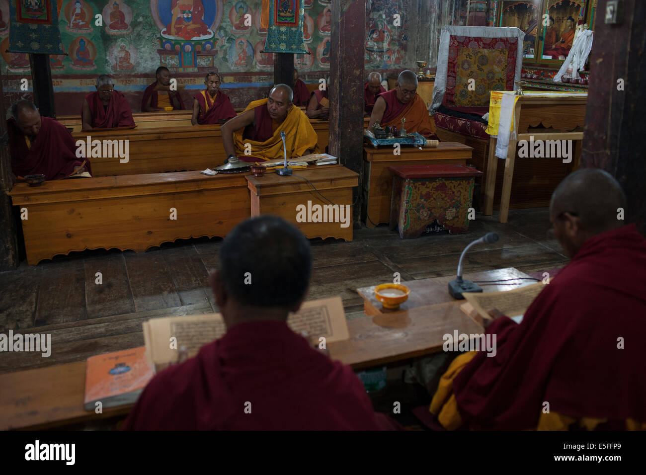 Monks during morning prayer in Thiksey Monastery Stock Photo - Alamy