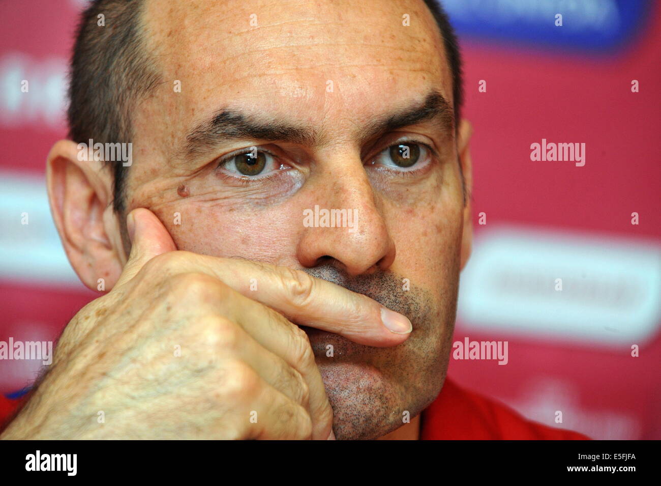 Women's volleyball team coach Carlo Parisi speaks at a press conference ...