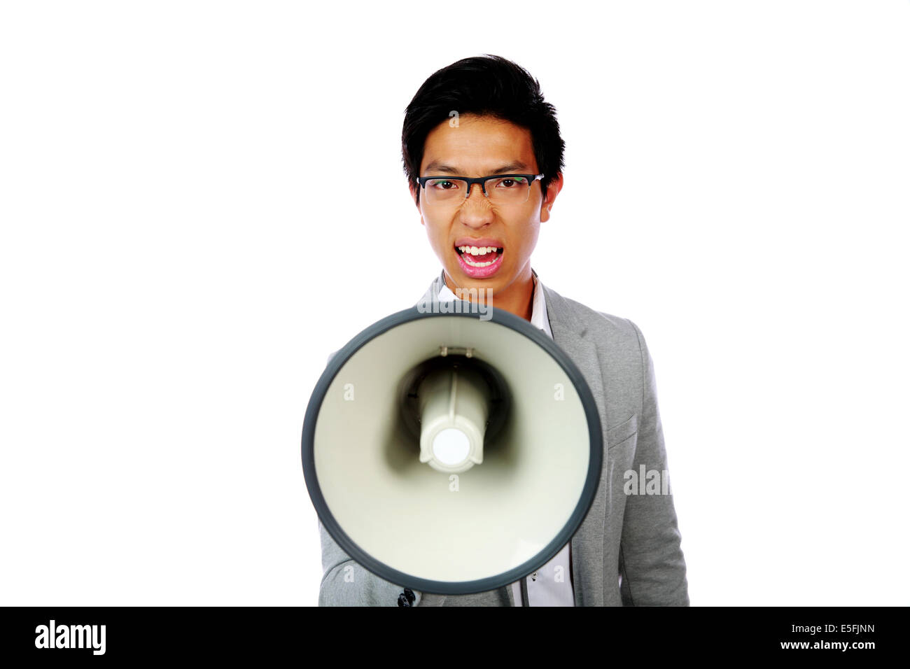 Portrait of angry asian man shouting with megaphone Stock Photo - Alamy