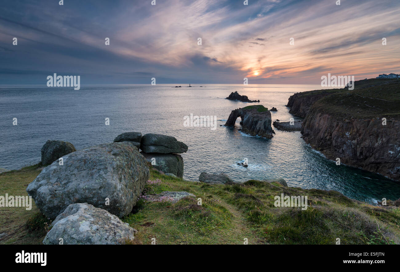The cliffs and sea arch at Land's End in Cornwall Stock Photo - Alamy