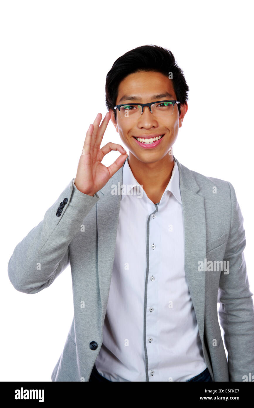 Happy asian man showing okay sign isolated on white background Stock ...