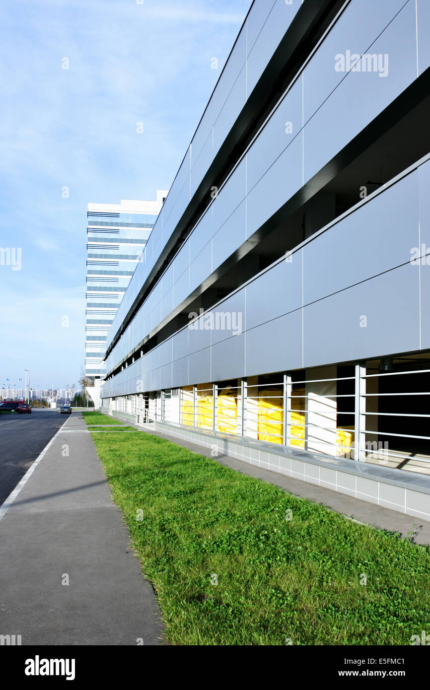 Perspective of car parking near office building Stock Photo - Alamy