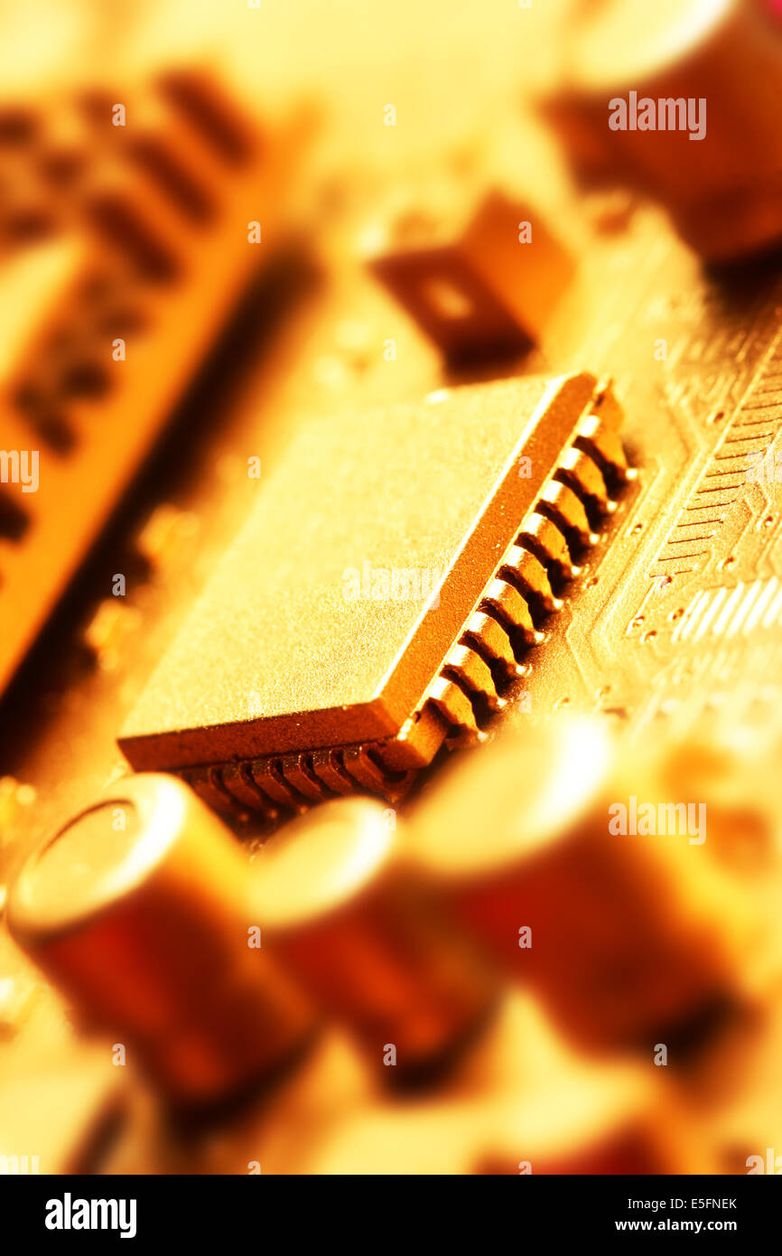 Gold circuit board close-up. Shallow DOF! Stock Photo - Alamy