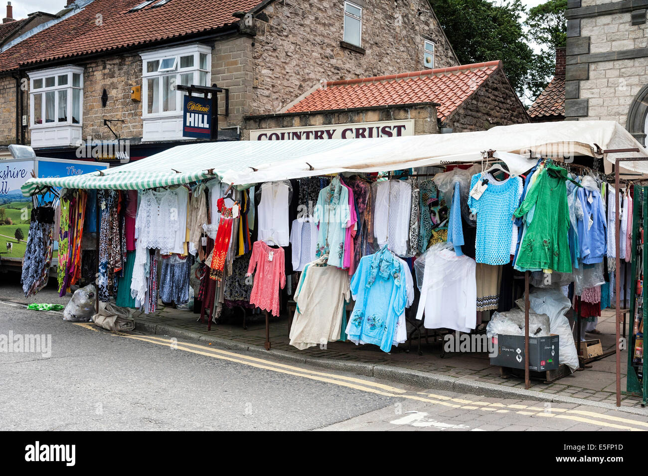 A clothes stall in Pickering market Stock Photo - Alamy