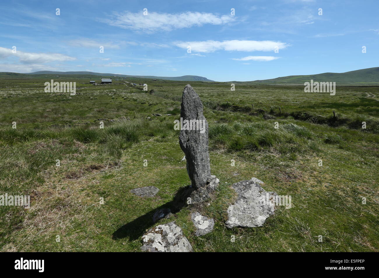 An ancient stone cross on Valentia Island, County Kerry in the South of ...