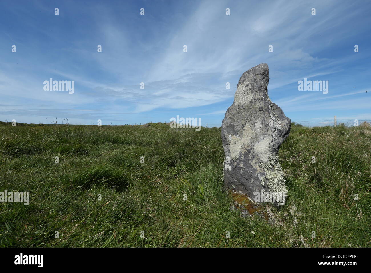 An ancient stone cross on Valentia Island, County Kerry in the South of ...