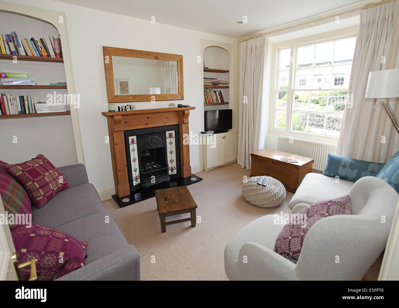 interior of a cottage with traditional open fireplace Stock Photo - Alamy