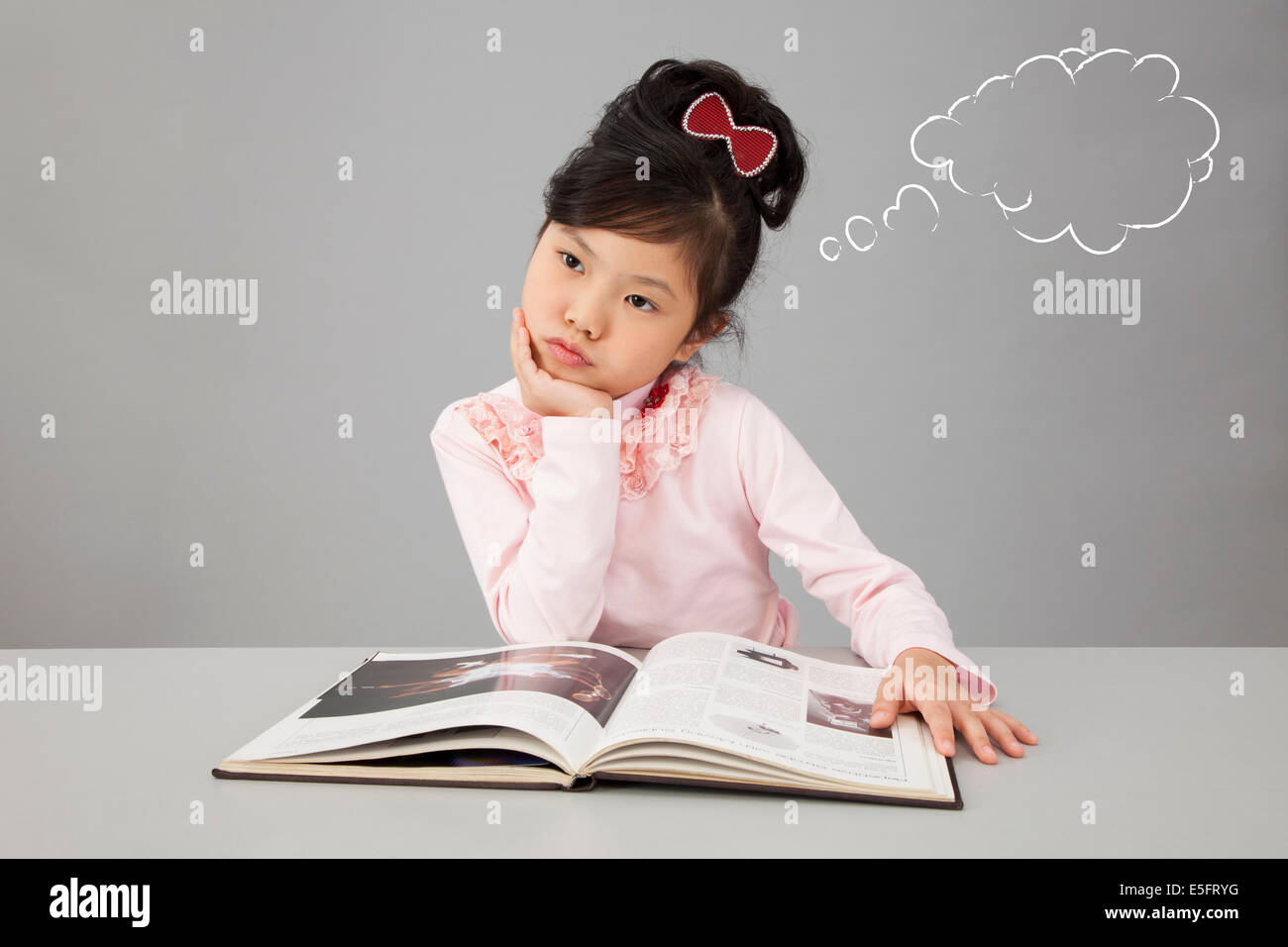 Asian chinese little girl dreaming about her future Stock Photo - Alamy
