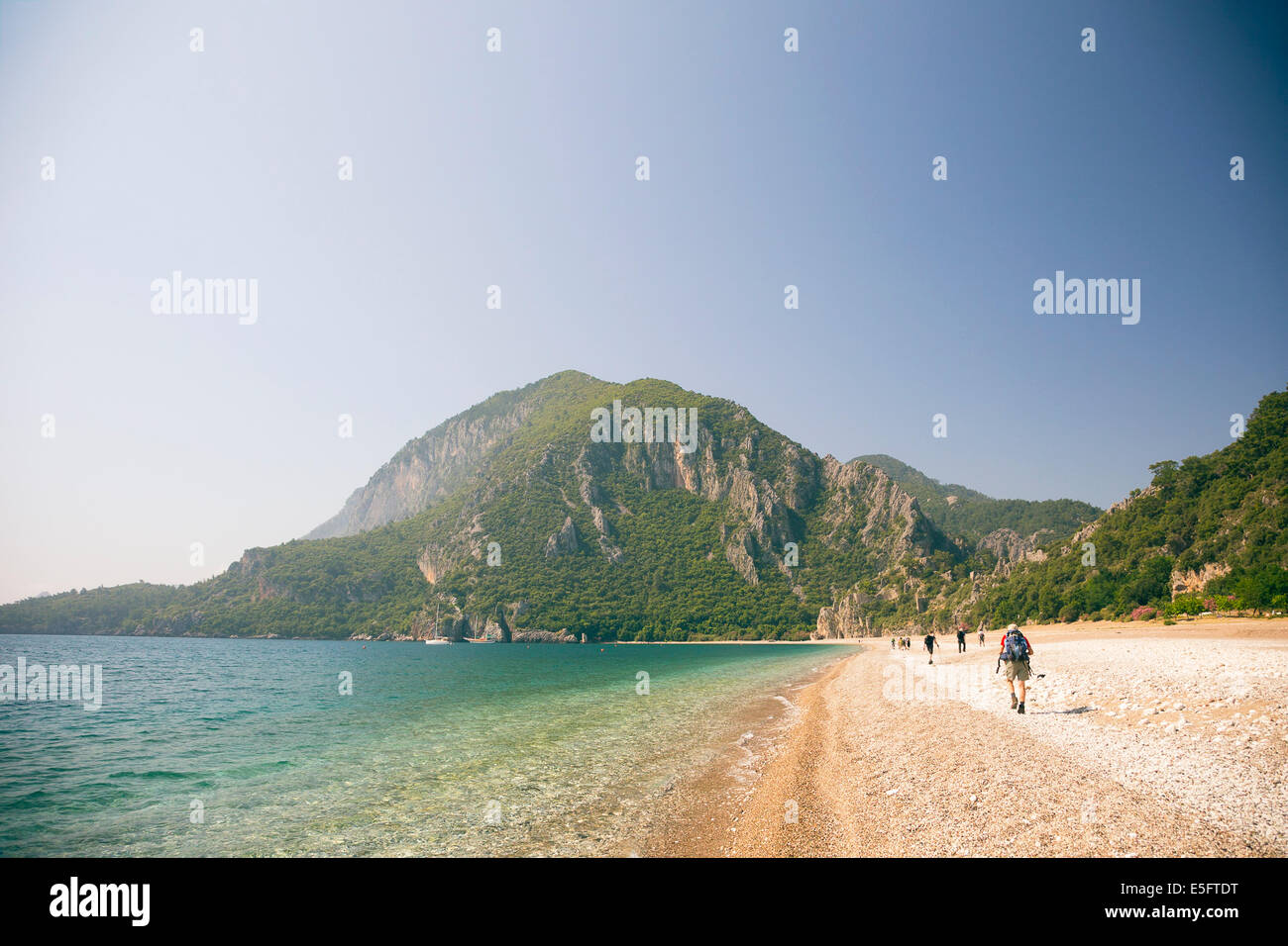 CIRALI, TURKEY Exodus trekking group on beach Stock Photo - Alamy
