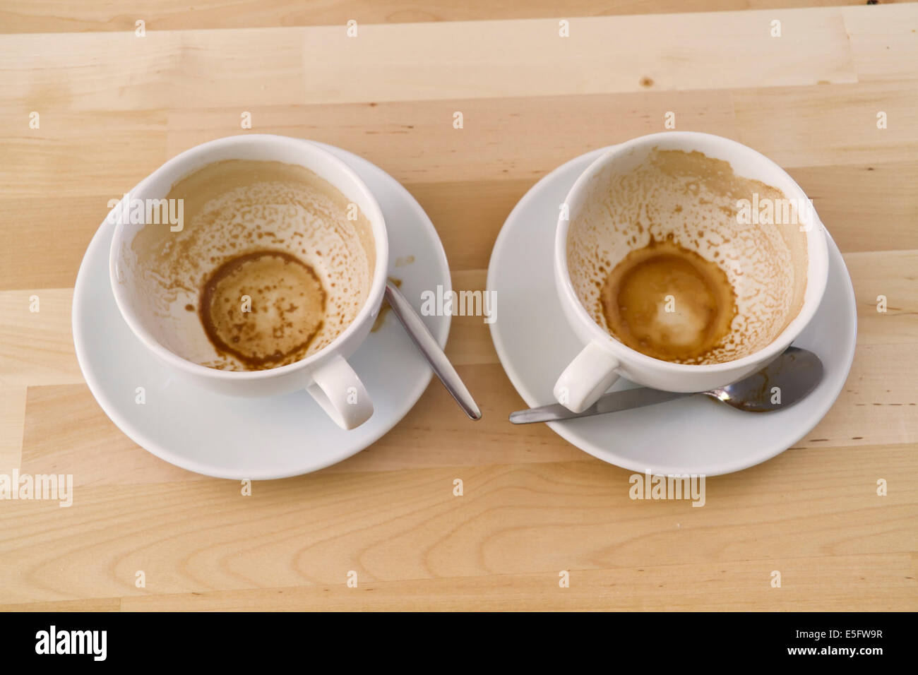 Empty coffee cups on a table hi-res stock photography and images - Alamy