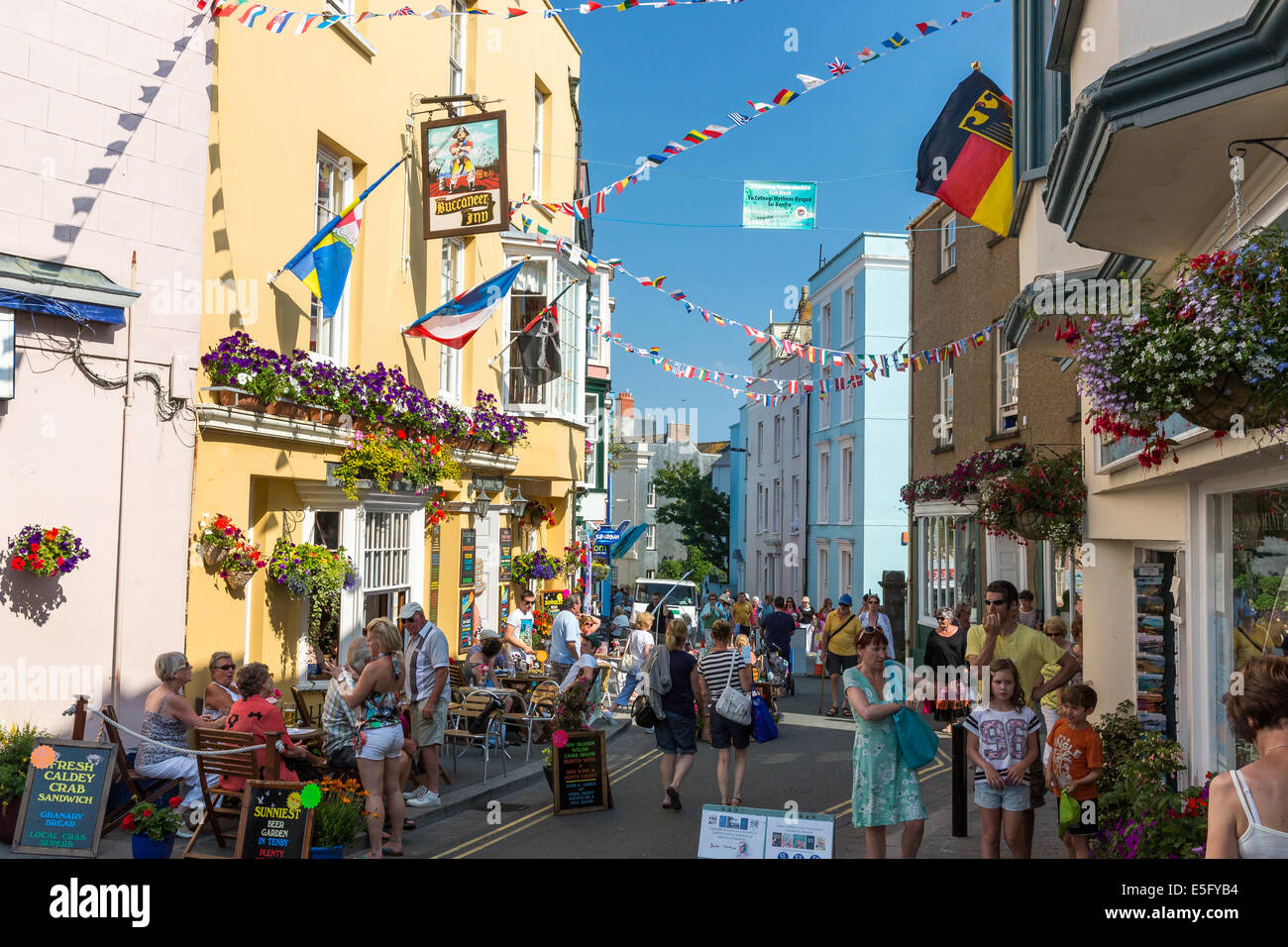 Tenby harbour town in Pembrokeshire with tourists walking around Stock ...
