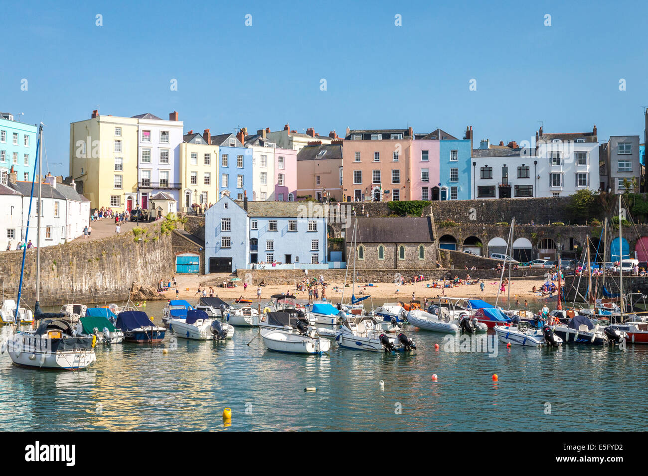 Tenby harbour full of boats on a sunny afternoon, the picturesque ...