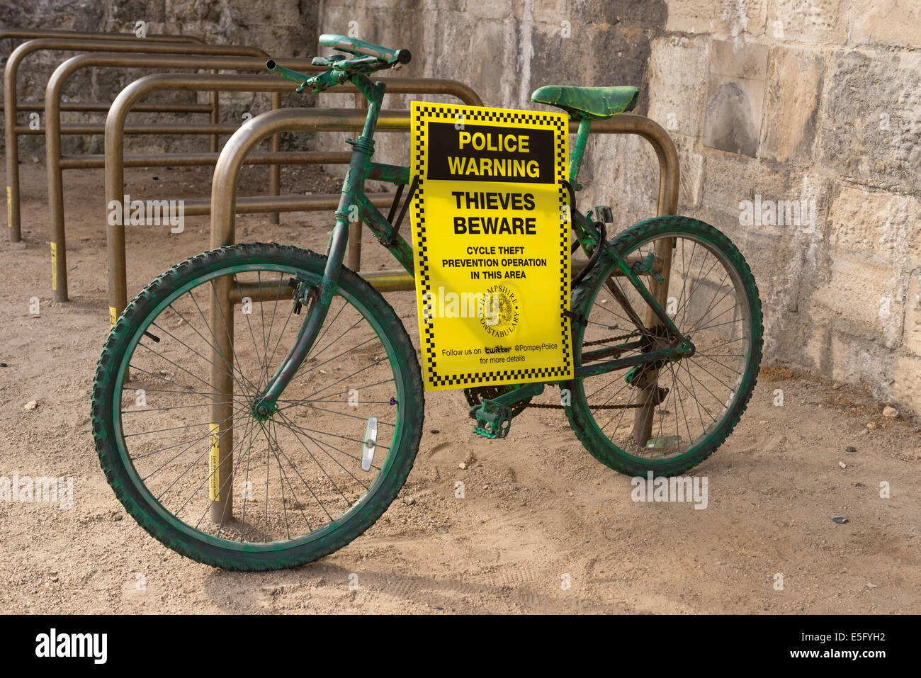 Bicycle put on display in old portsmouth displaying a warning sign from ...