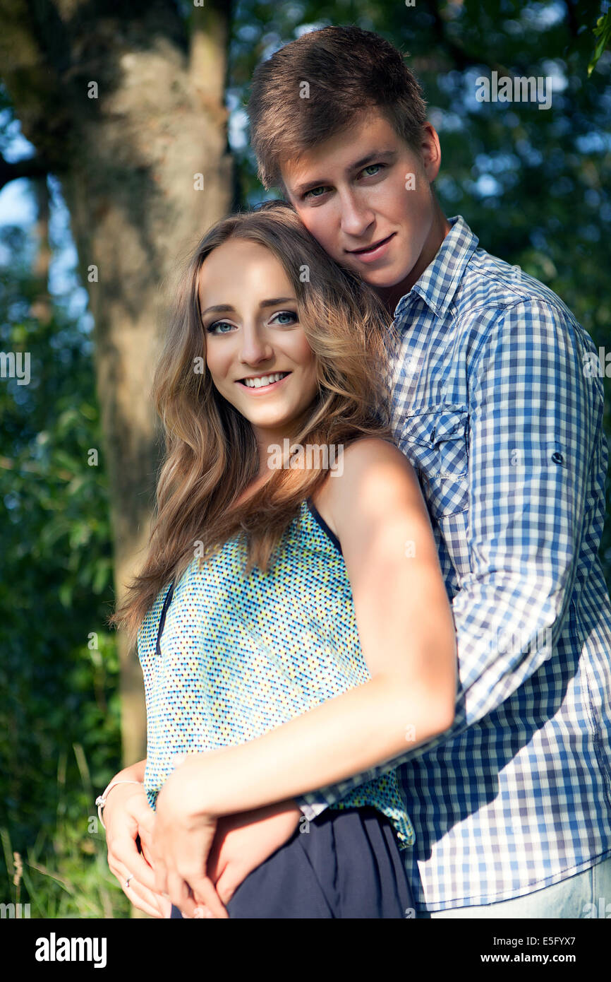Young couple in nature on summer, they looking into the camera Stock ...