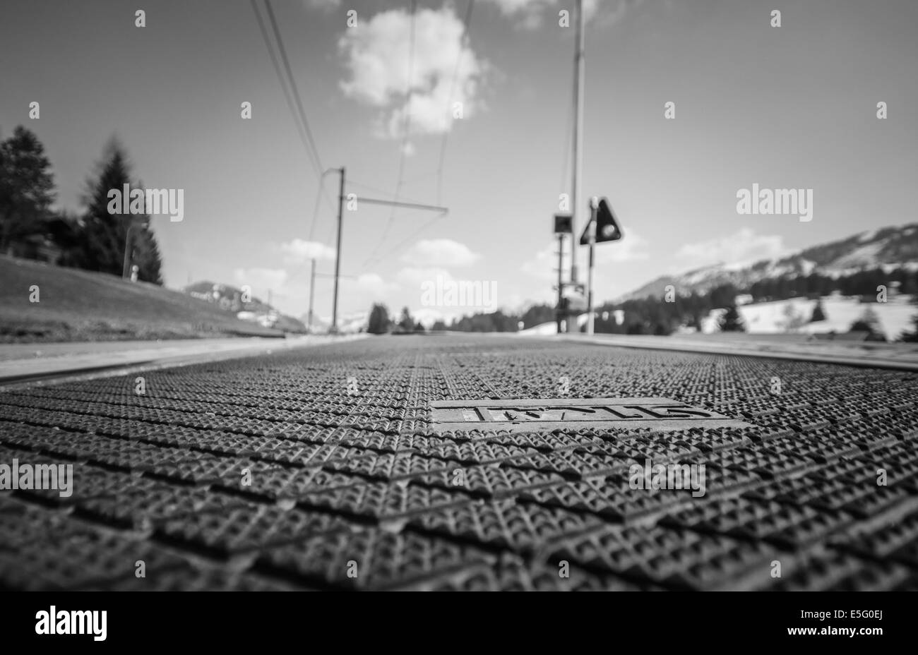 Crossing grid from a shallow angle on an Alpine railway track Stock ...