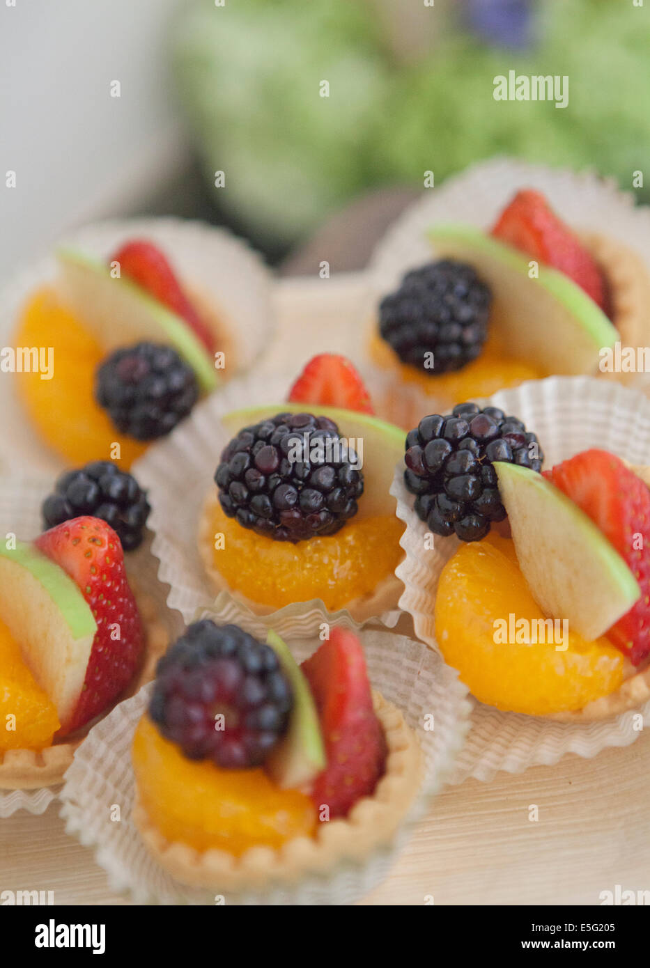 Fruit filled mini tarts Stock Photo - Alamy