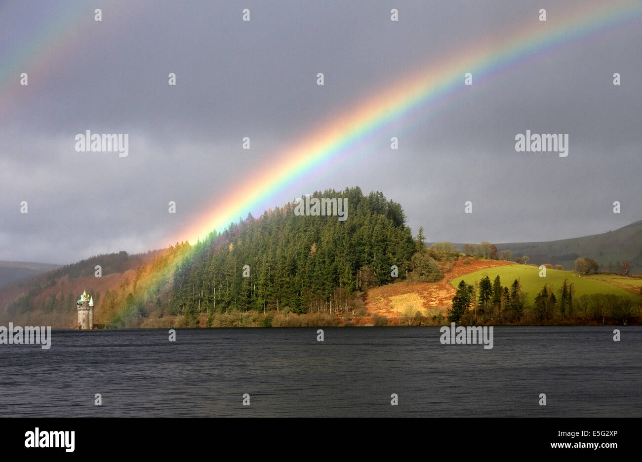 Rainbow highlights the gothic Straining Tower on Lake Vyrnwy (Victorian ...