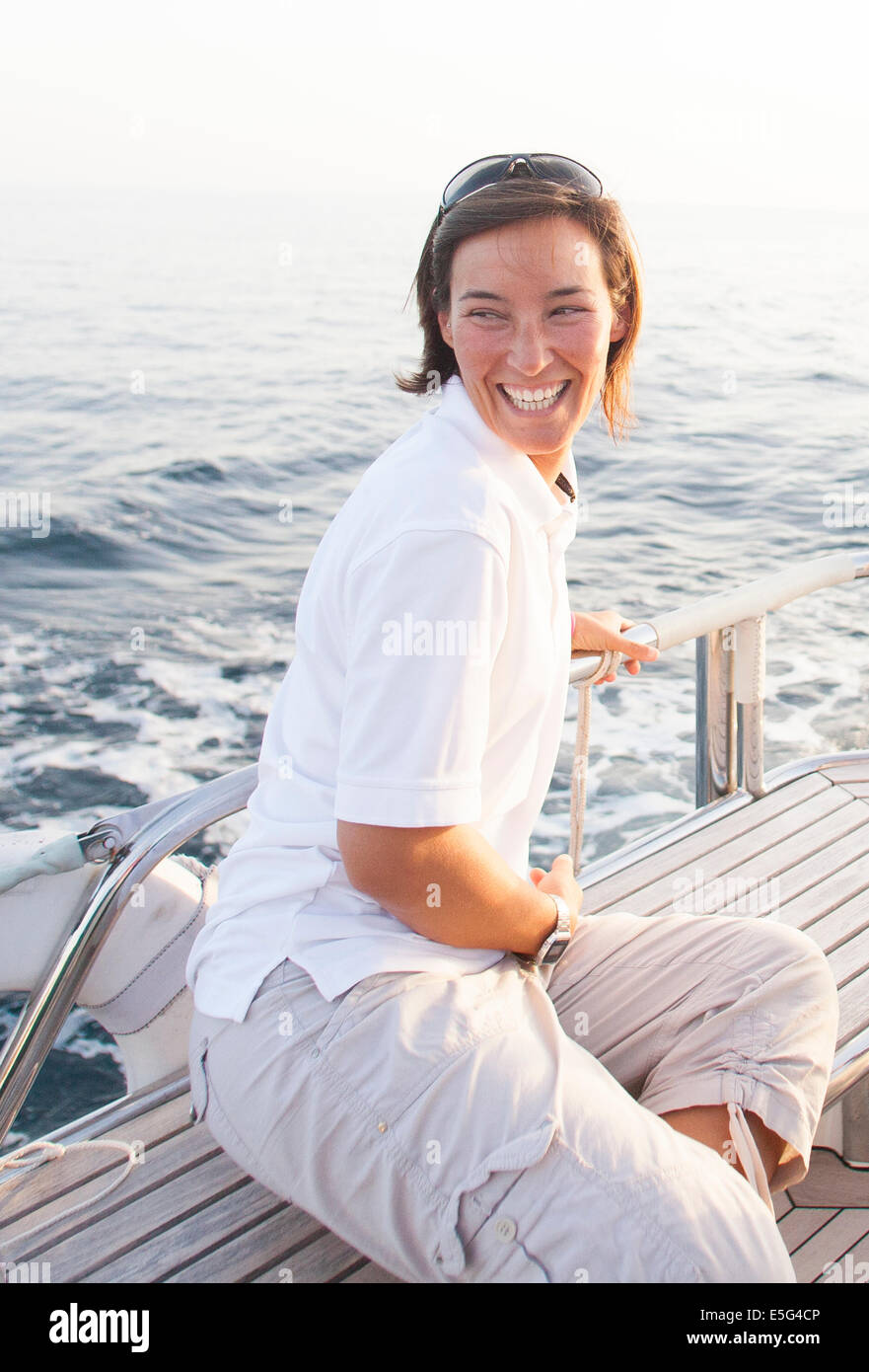 Woman smiling on boat Stock Photo - Alamy
