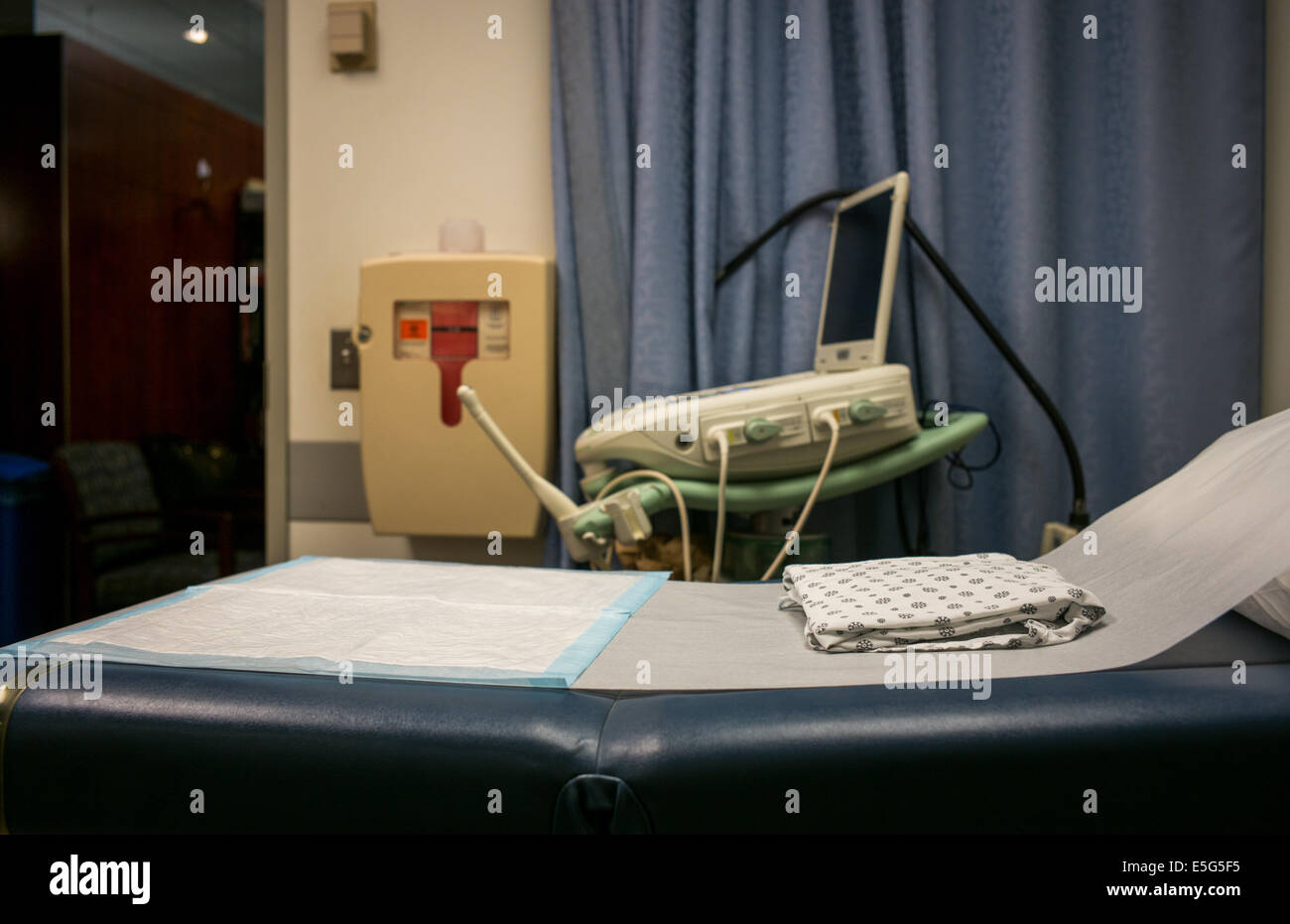 A medical examination room stands ready to accept a patient for a check ...