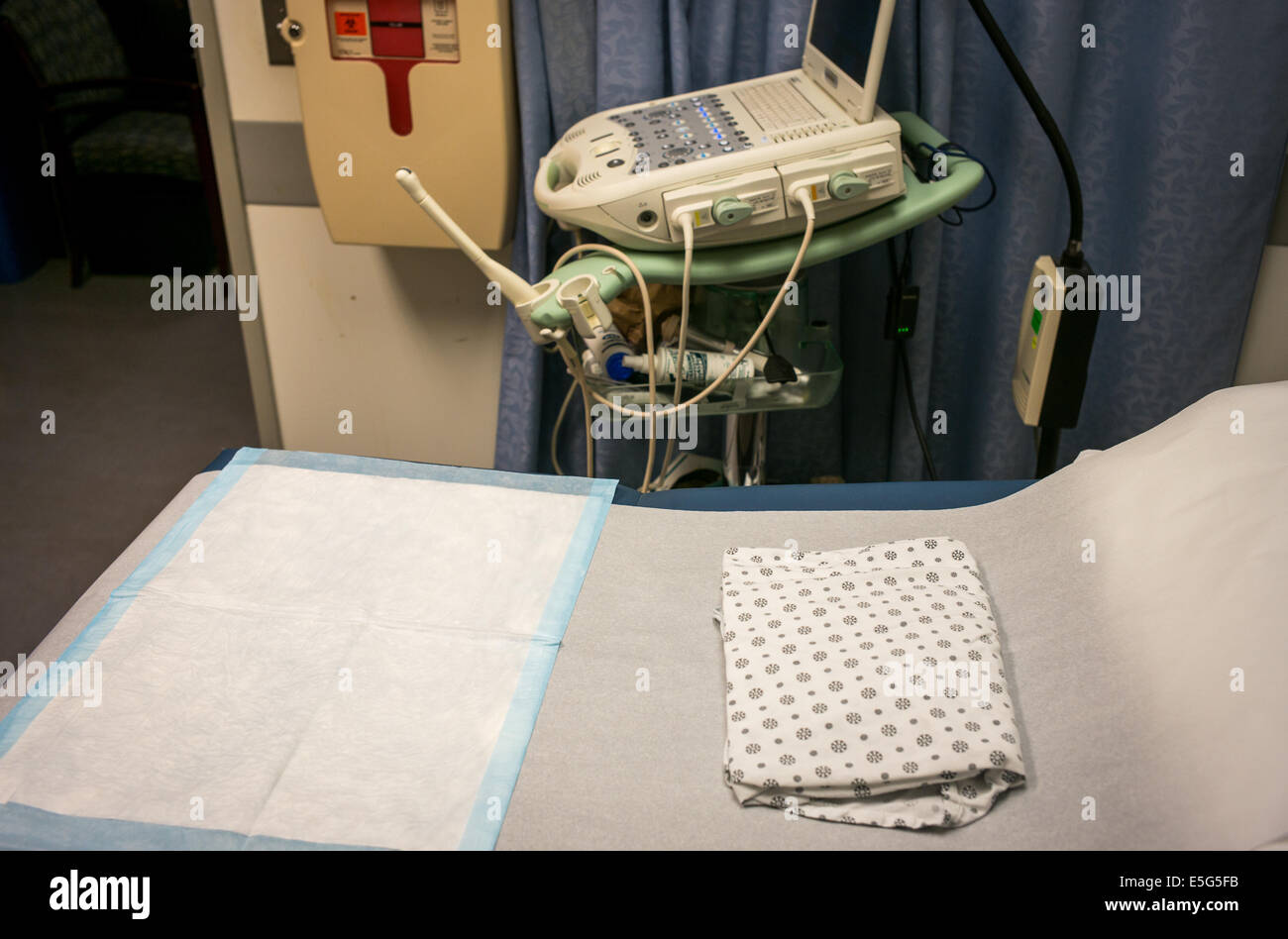 A medical examination room stands ready to accept a patient for a check ...