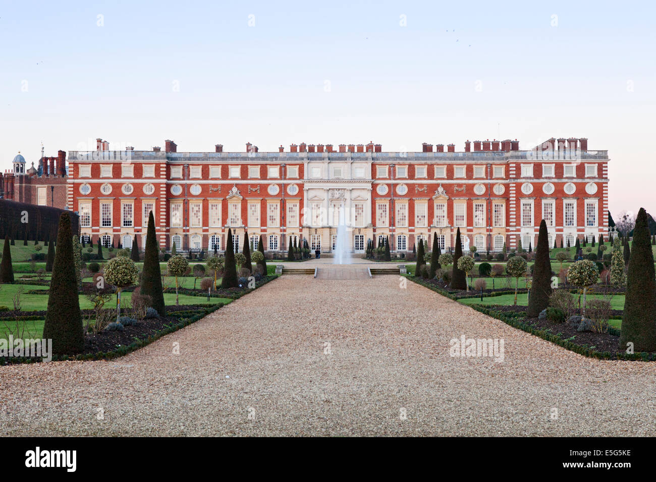 The Christopher Wren facade and gardens of Hampton Court Palace, Surrey ...