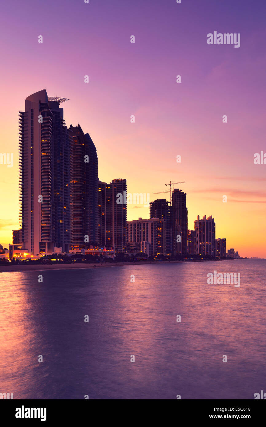 Beautiful beach sunset with condominiums and skyscraper in Sunny Isles ...