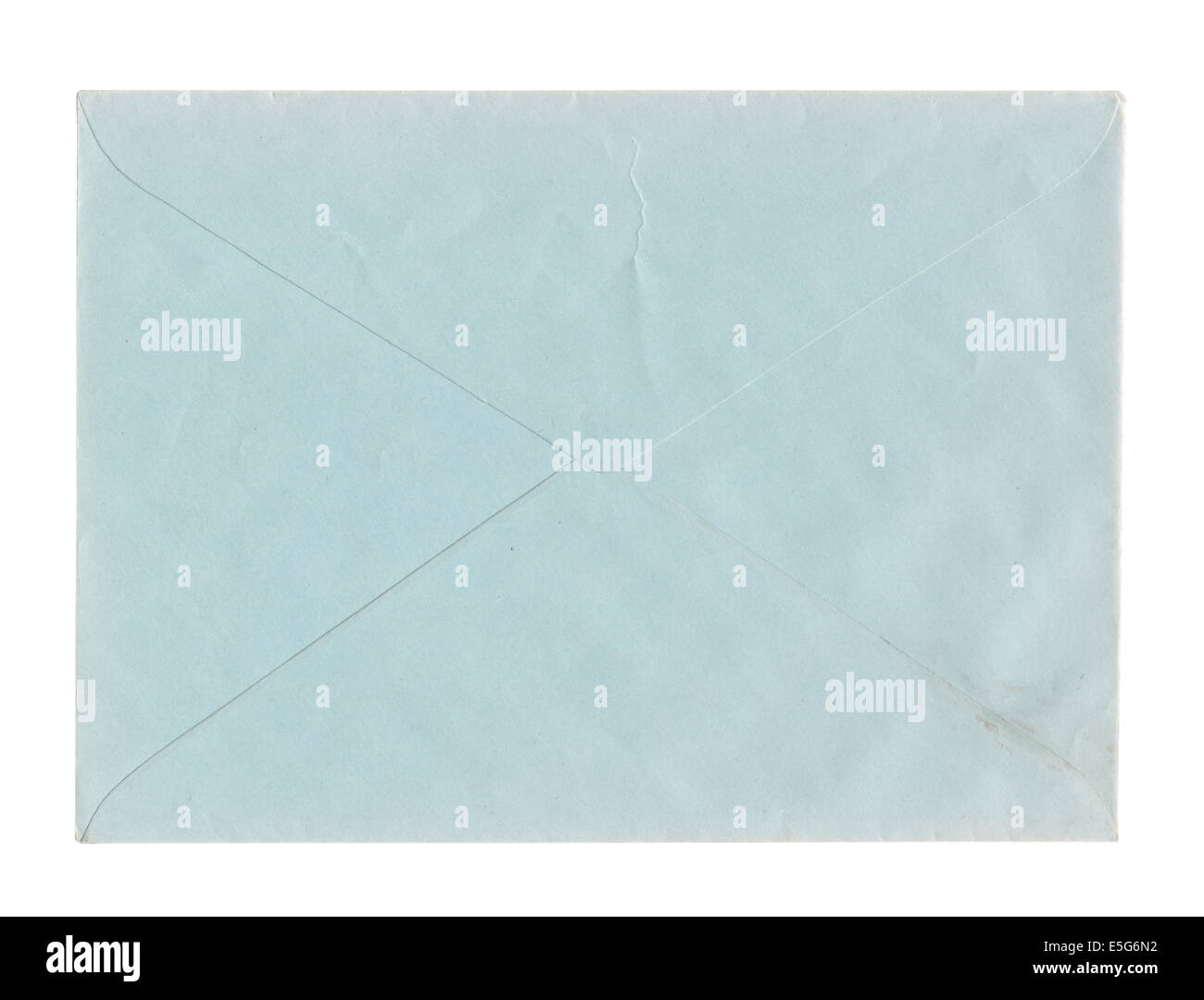 A classic old envelope with wrinkles and marks in baby blue colour ...