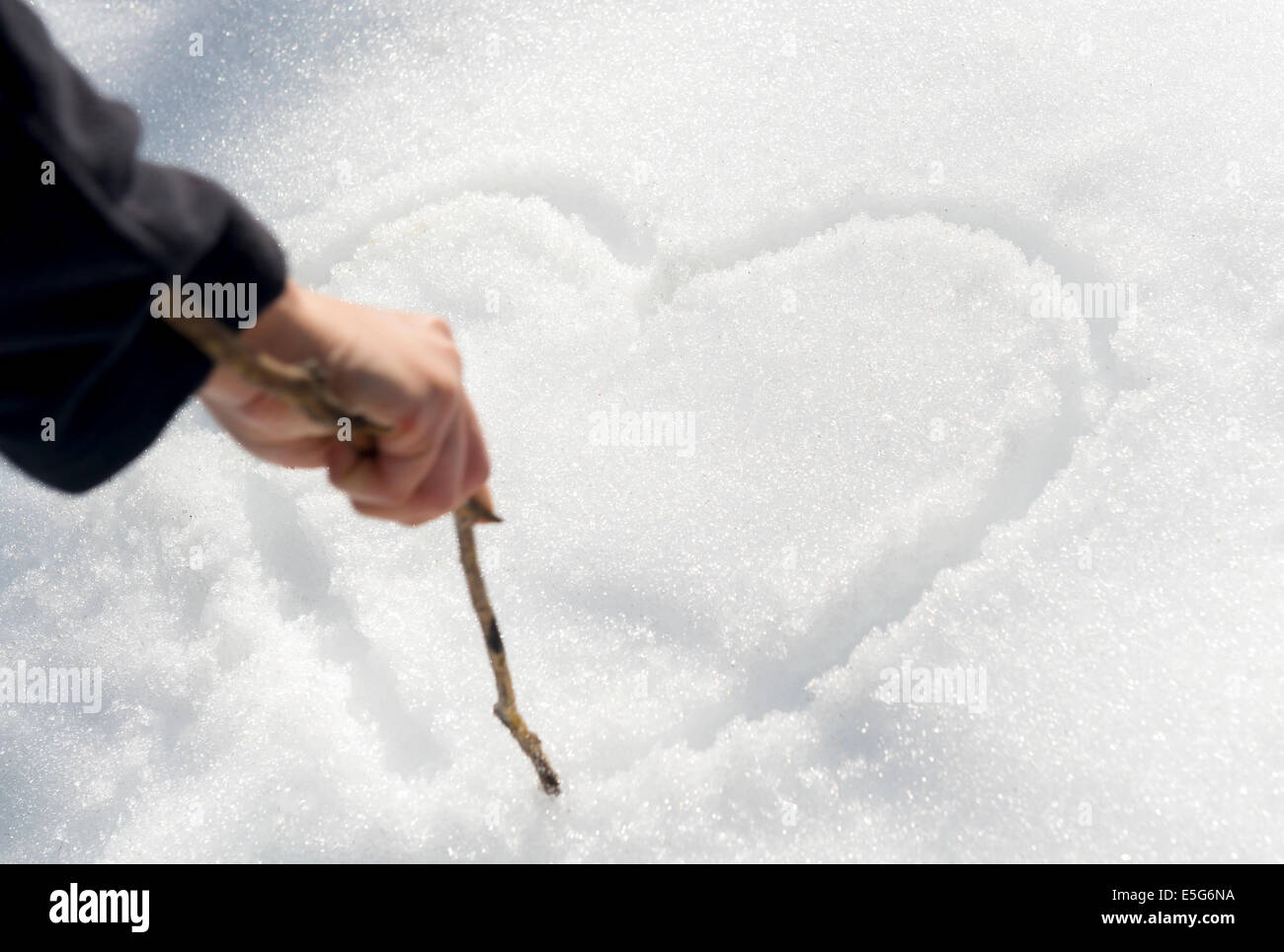 Snow Heart In Hand