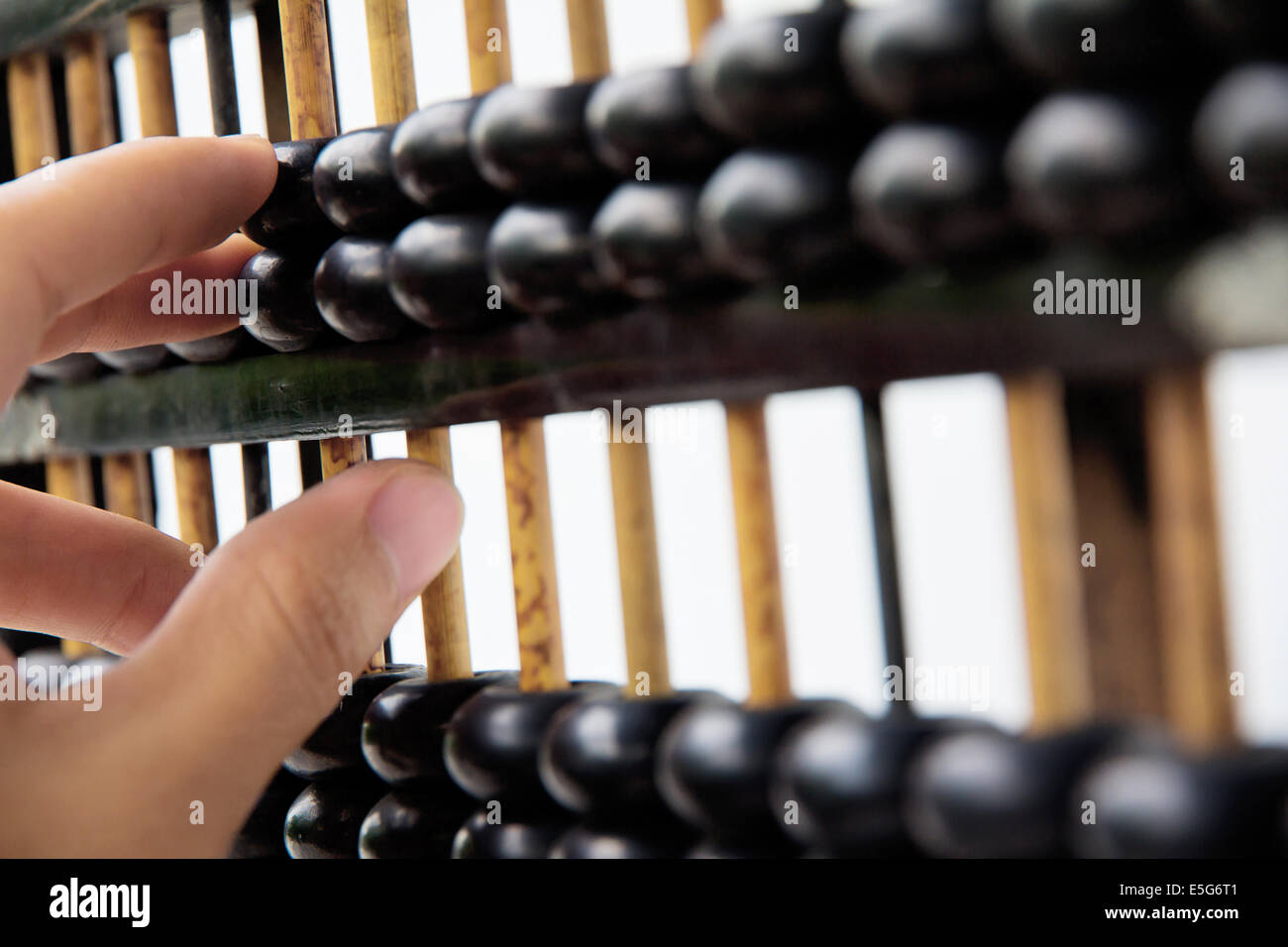 hand hold abacus Stock Photo - Alamy