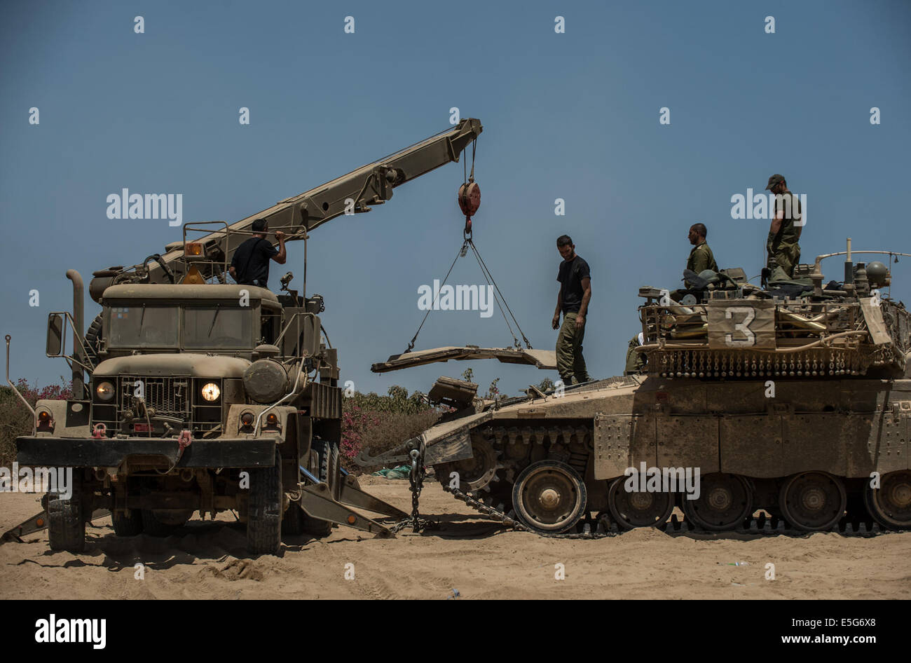 Gaza Border. 30th July, 2014. The armor of an Israeli APC is hoisted ...