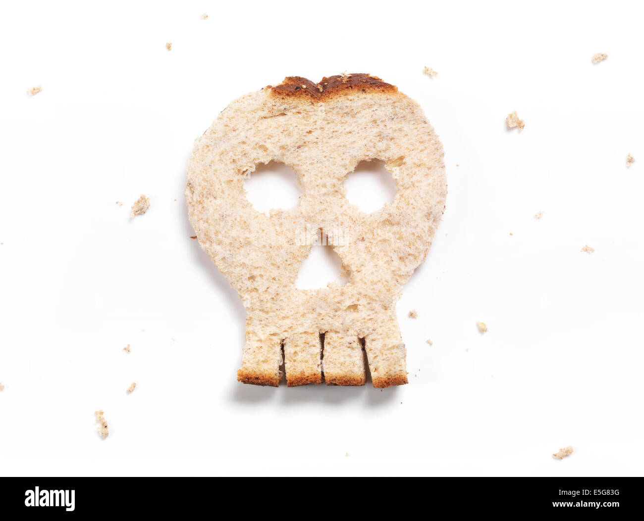 Skull made of bread isolated on white background Stock Photo - Alamy