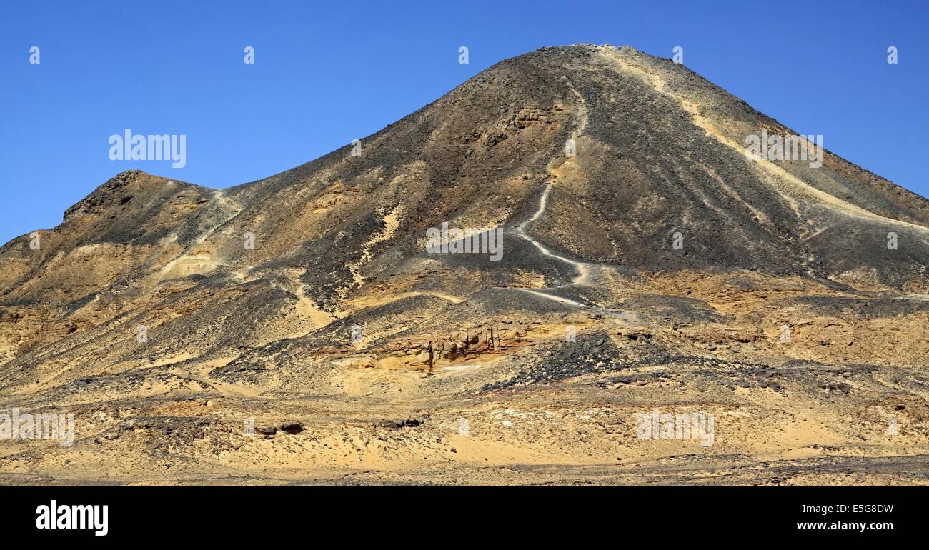 Black Stone formations in the Black desert in egypt Stock Photo - Alamy