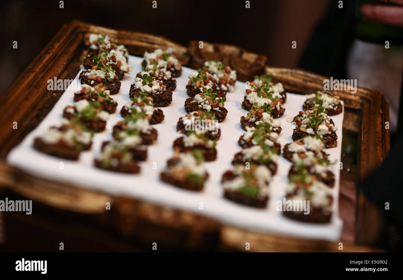 Canapes on tray at corporate funtion Stock Photo - Alamy