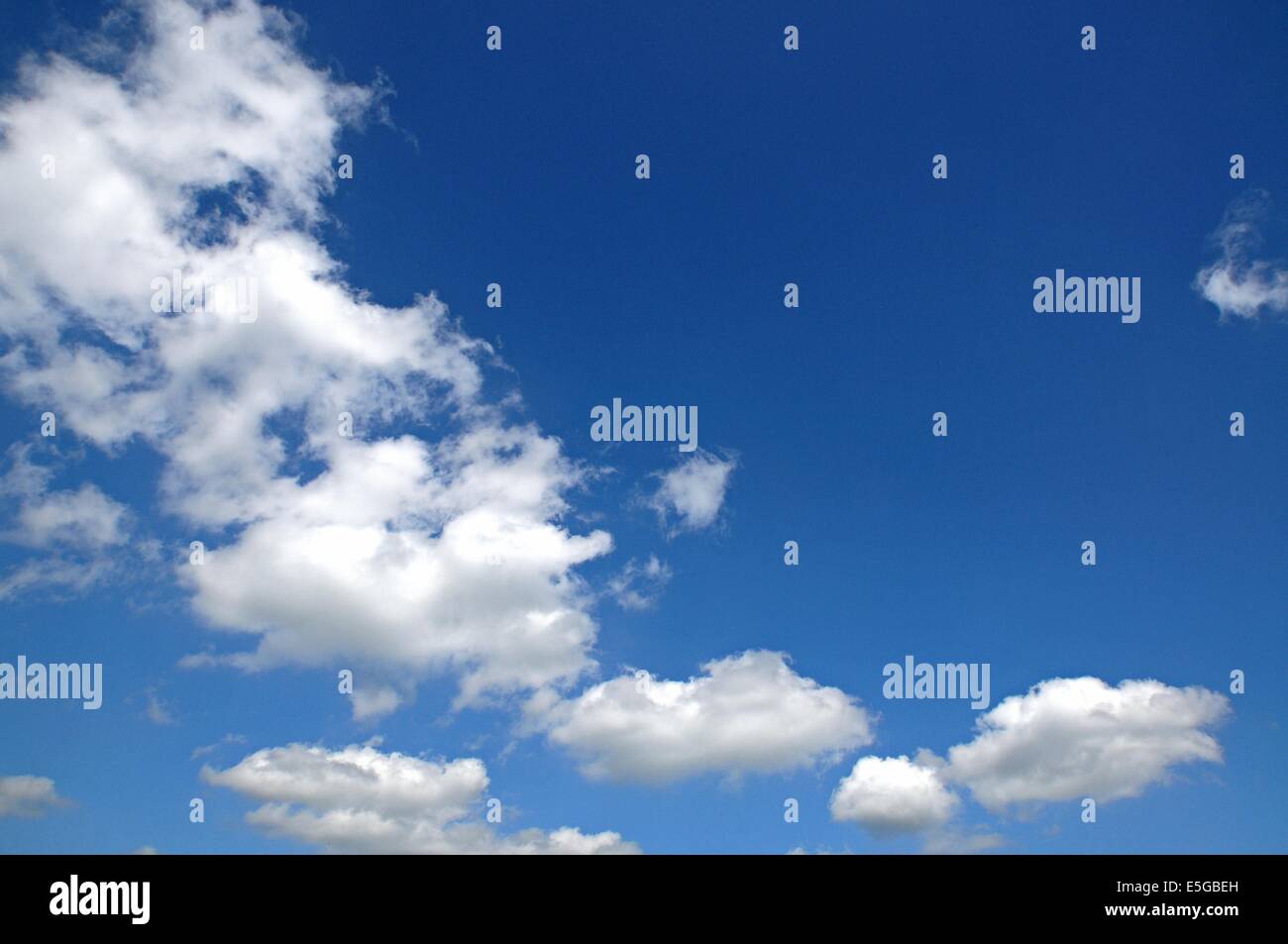 Sky blue small white cumulus cloud hi-res stock photography and images ...